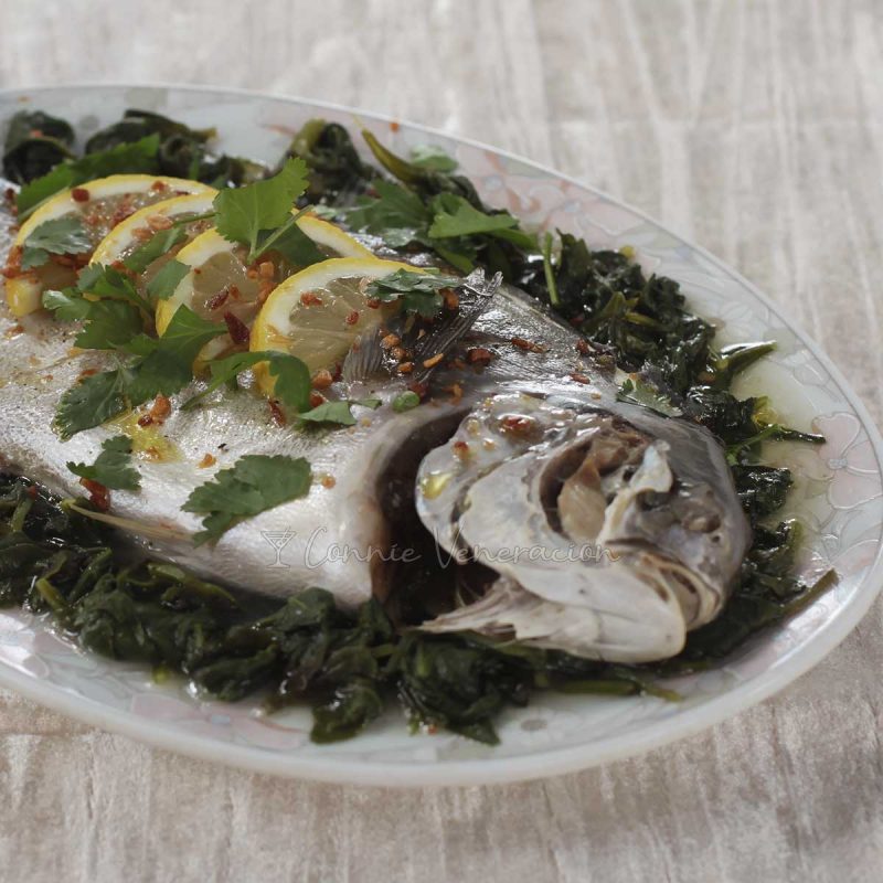Steamed whole pompano with lemon and olive oil