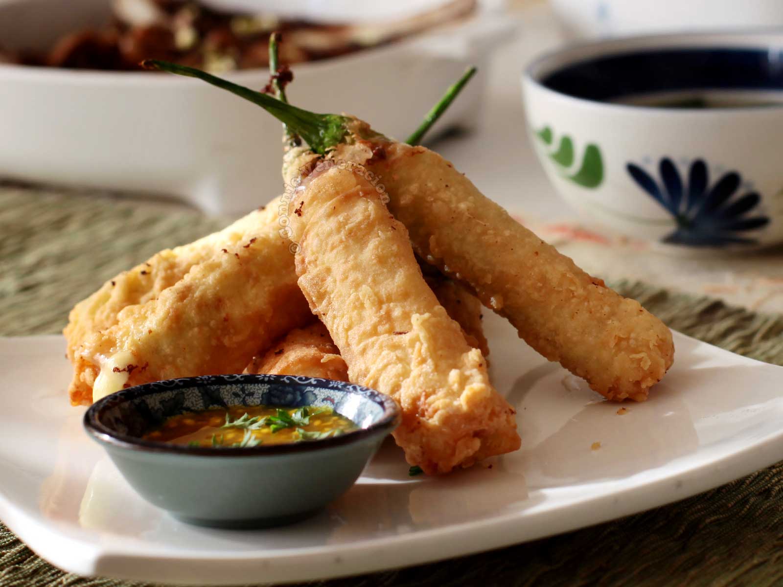 Cheese-stuffed chili spring rolls