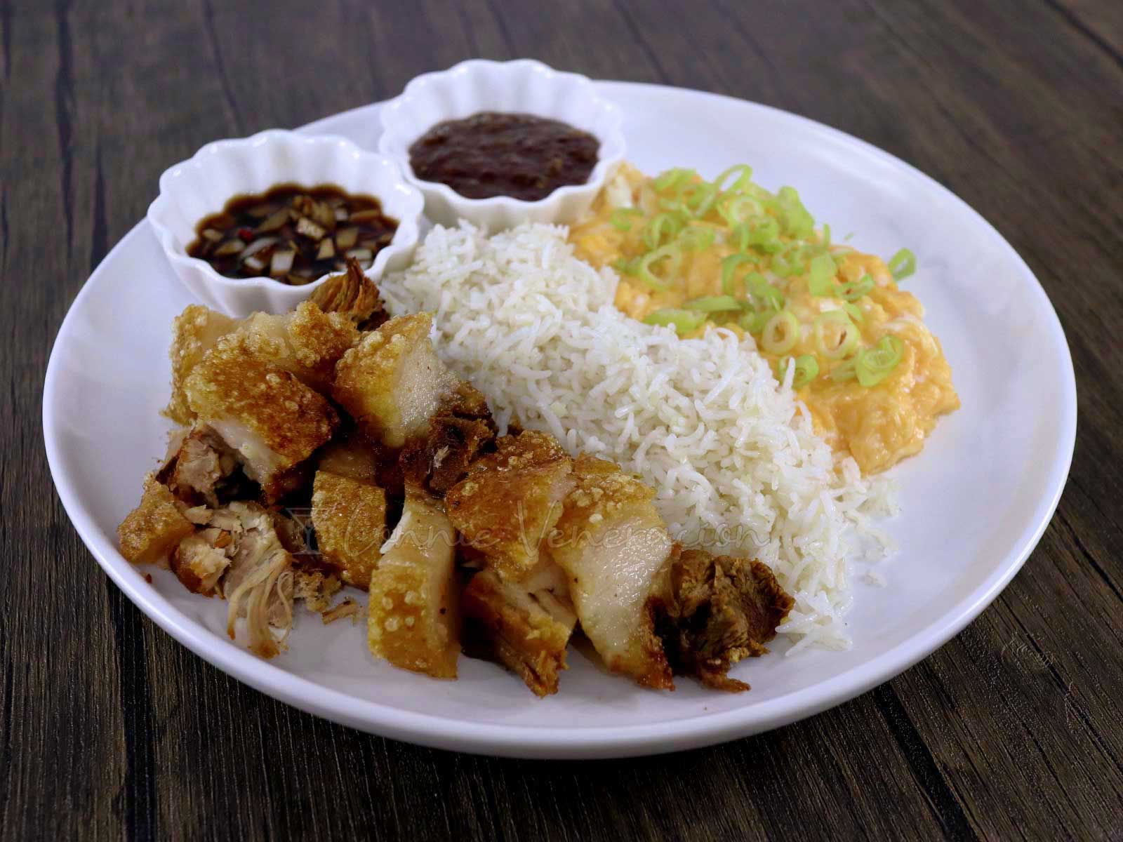 Crispy air fried pork belly, rice and egg (lechonsilog)